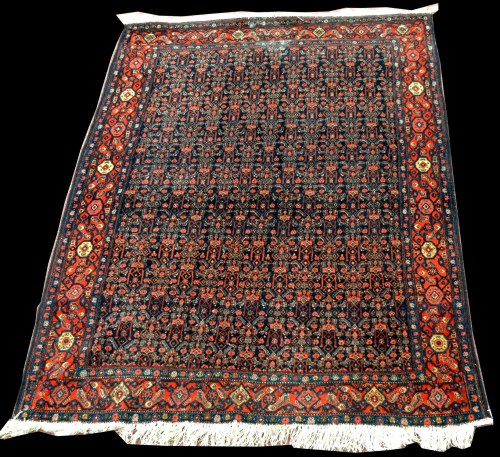 Lot 954 - A Hamadan rug, with small flowerhead design,
