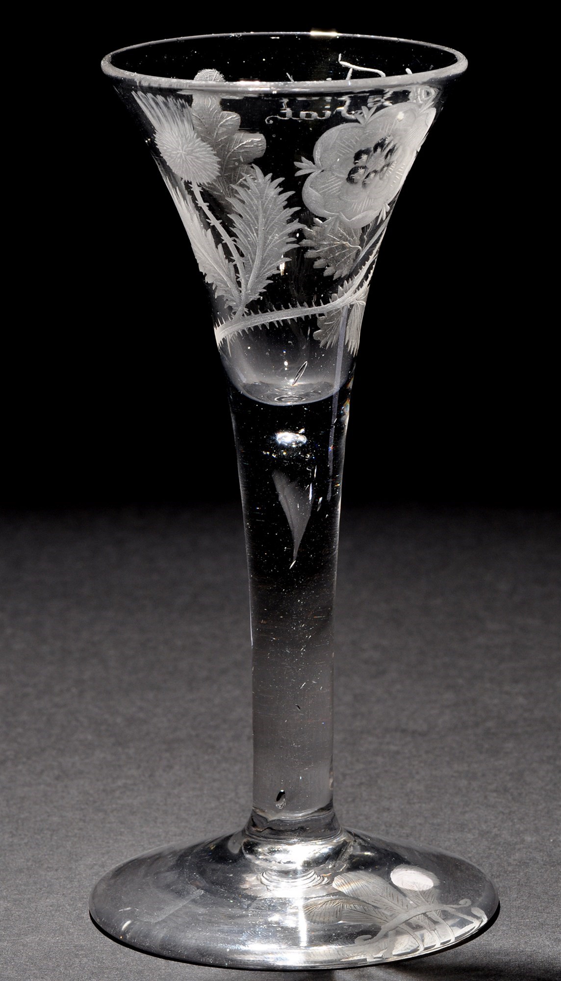 Lot 214 - A rare Jacobite wine glass, the drawn
