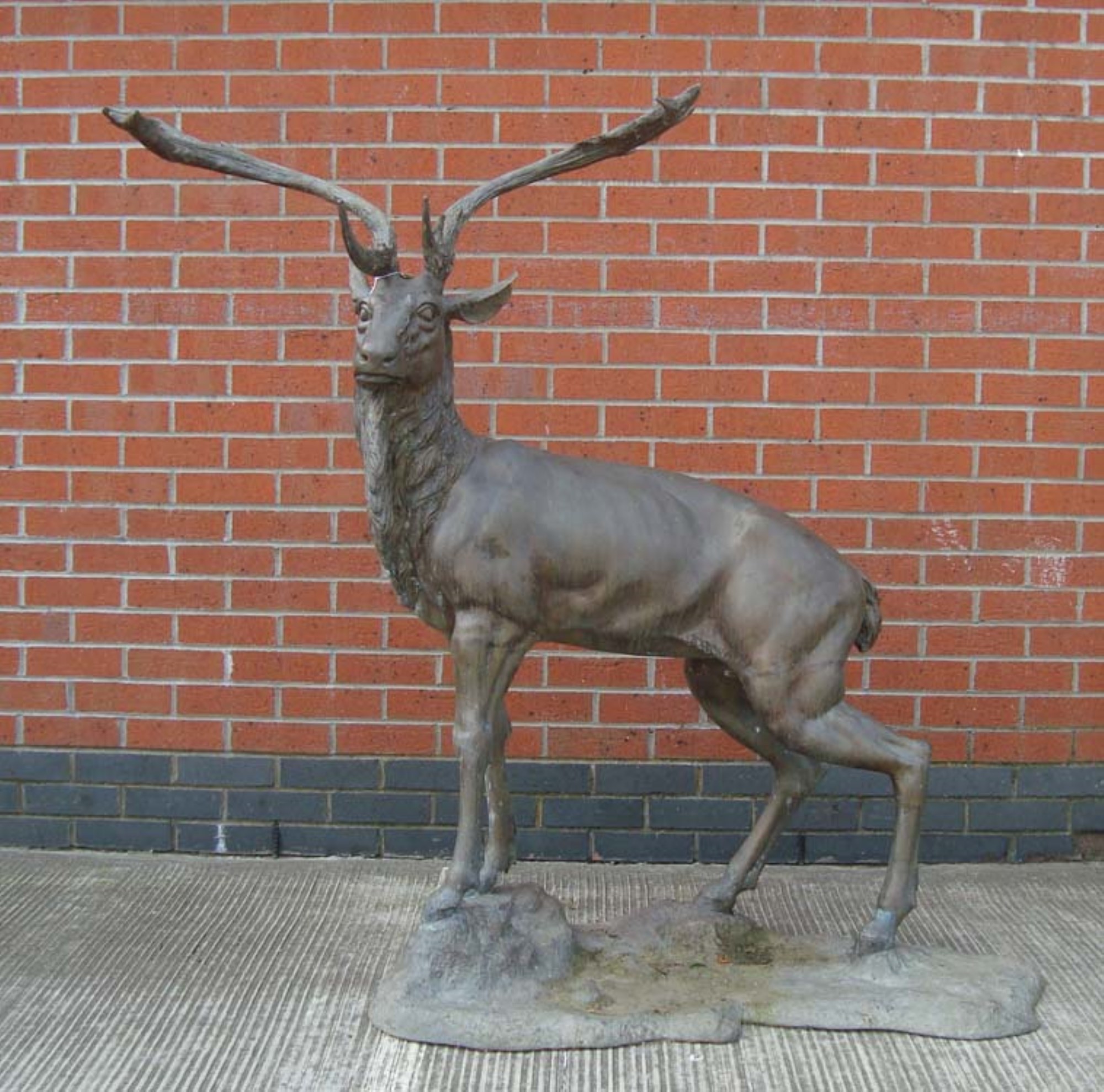 Lot 1127 - A cast metal stag, late 20th Century,
