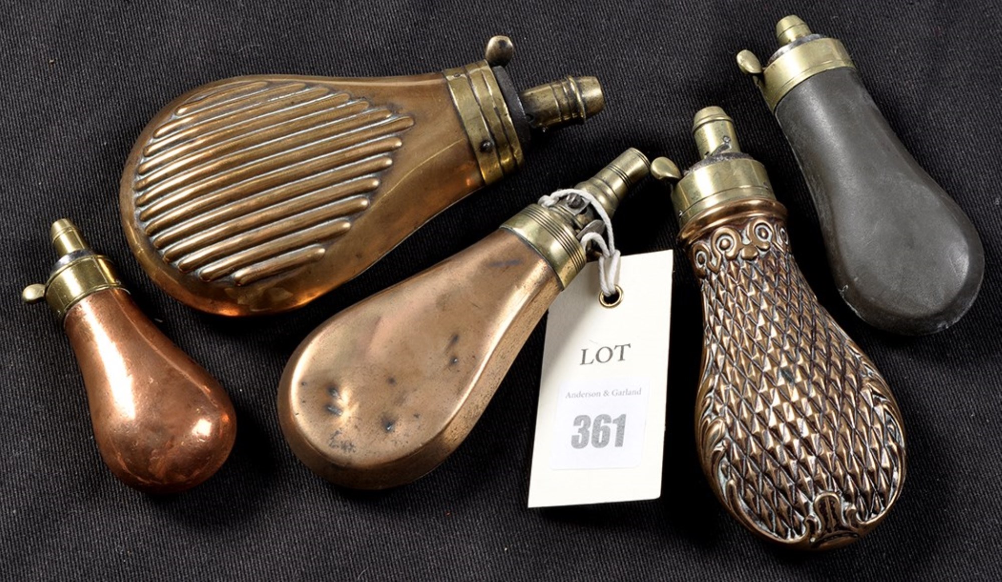 Lot 361 - Five 19th Century pistol powder flasks, one