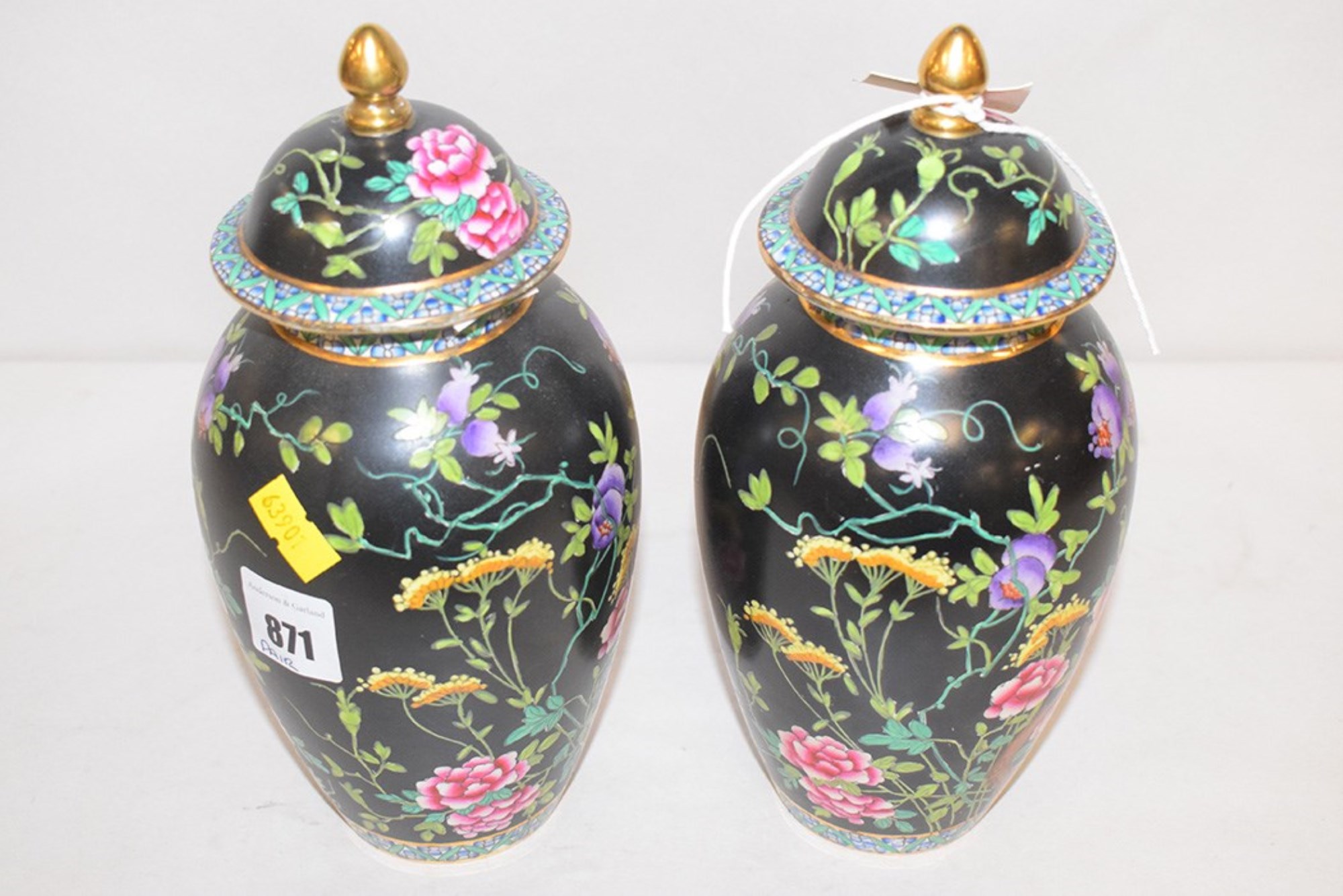 Lot 871 - A pair of Maling lidded vases, decorated