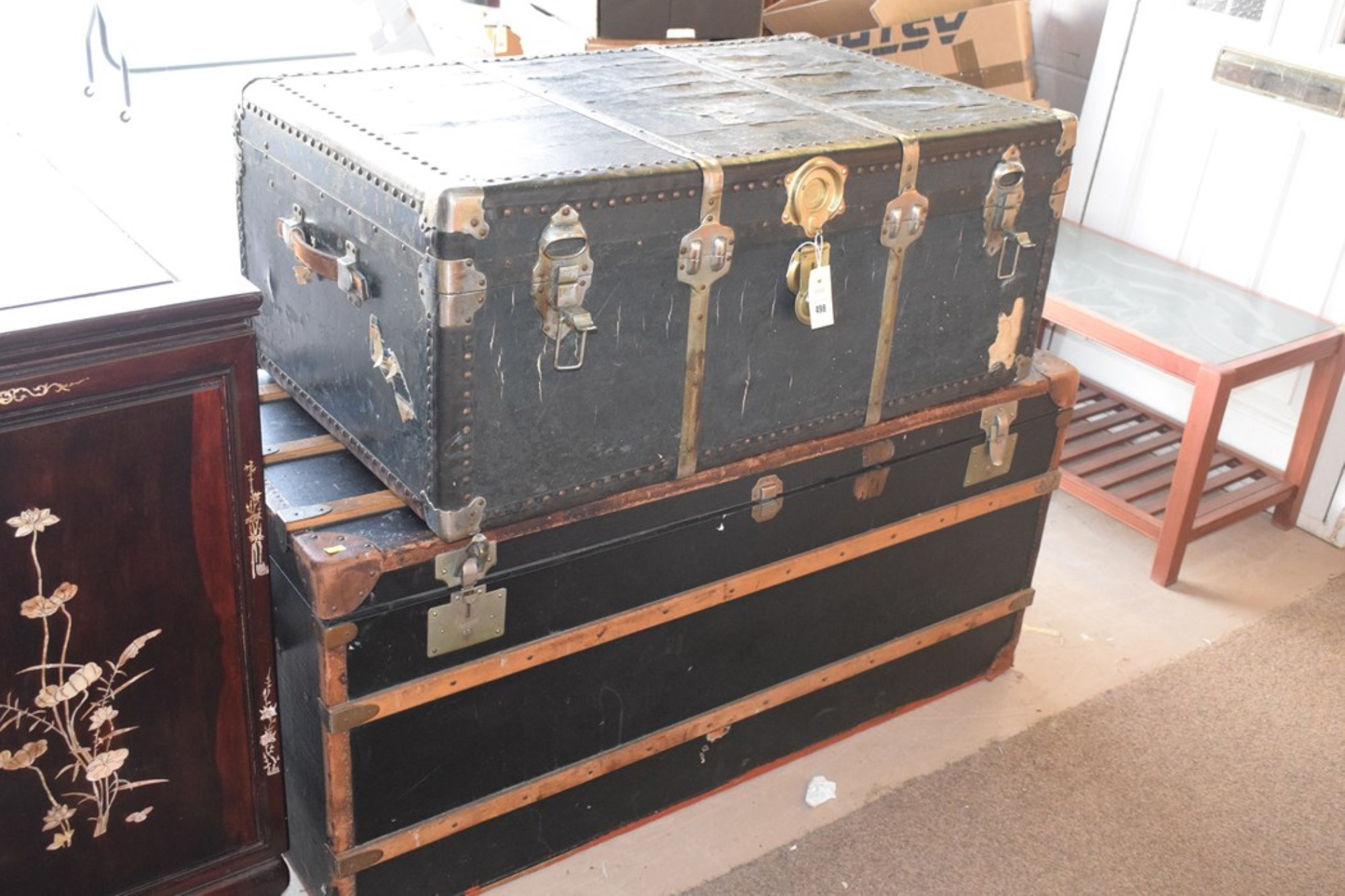 Lot 498 - Two old travelling trunks with metal and