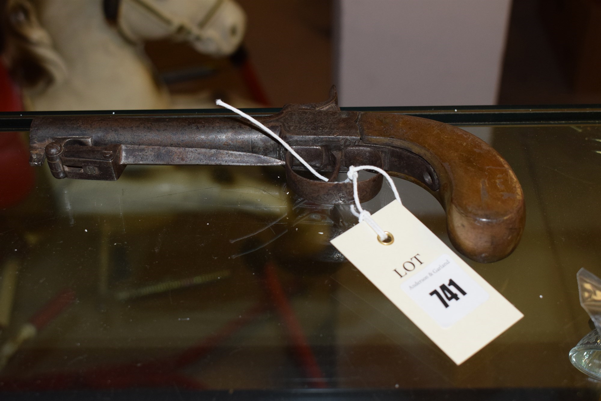 Lot 741 - A percussion pistol with barrel above