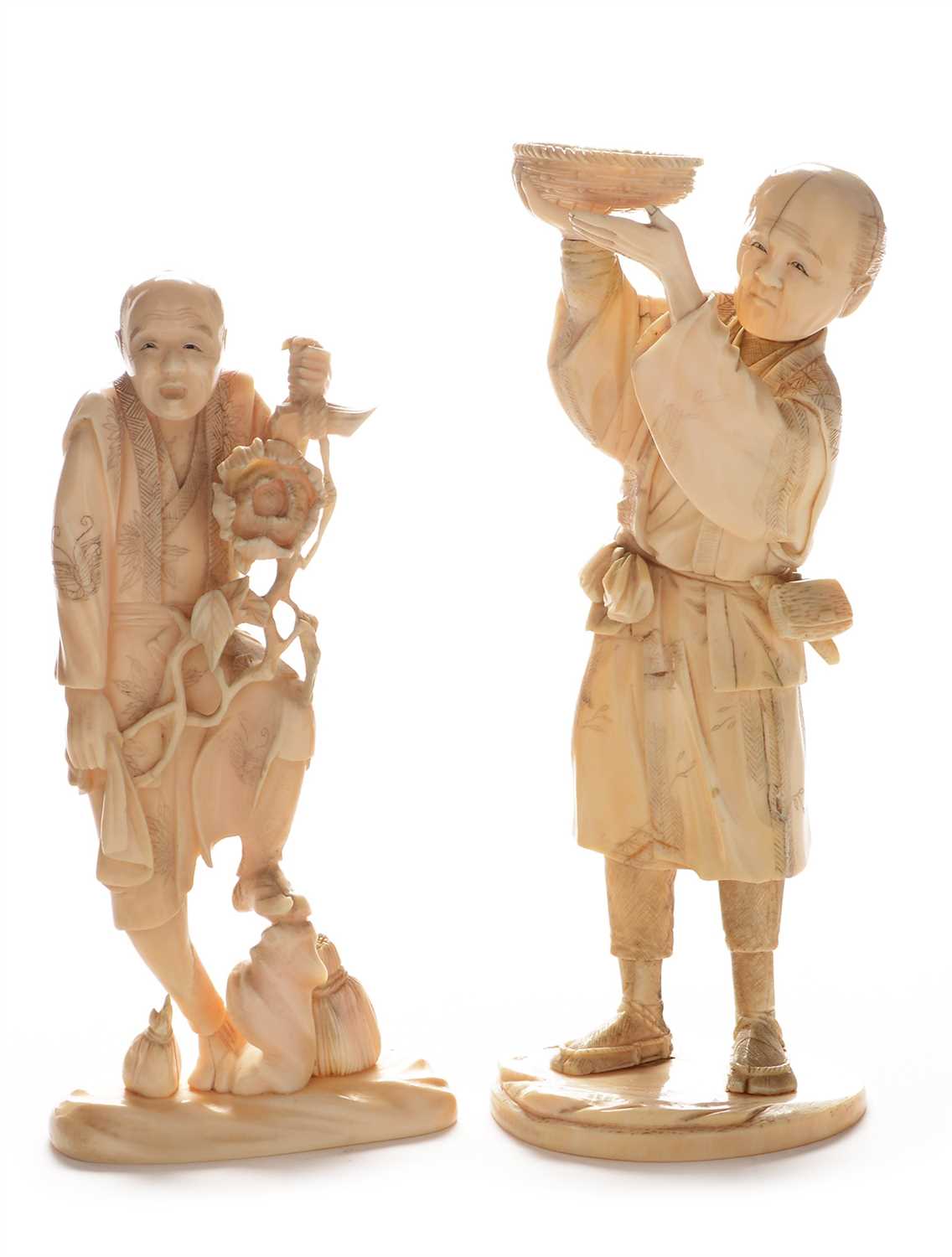 Lot 410 - Two Japanese Meiji period ivory carvings