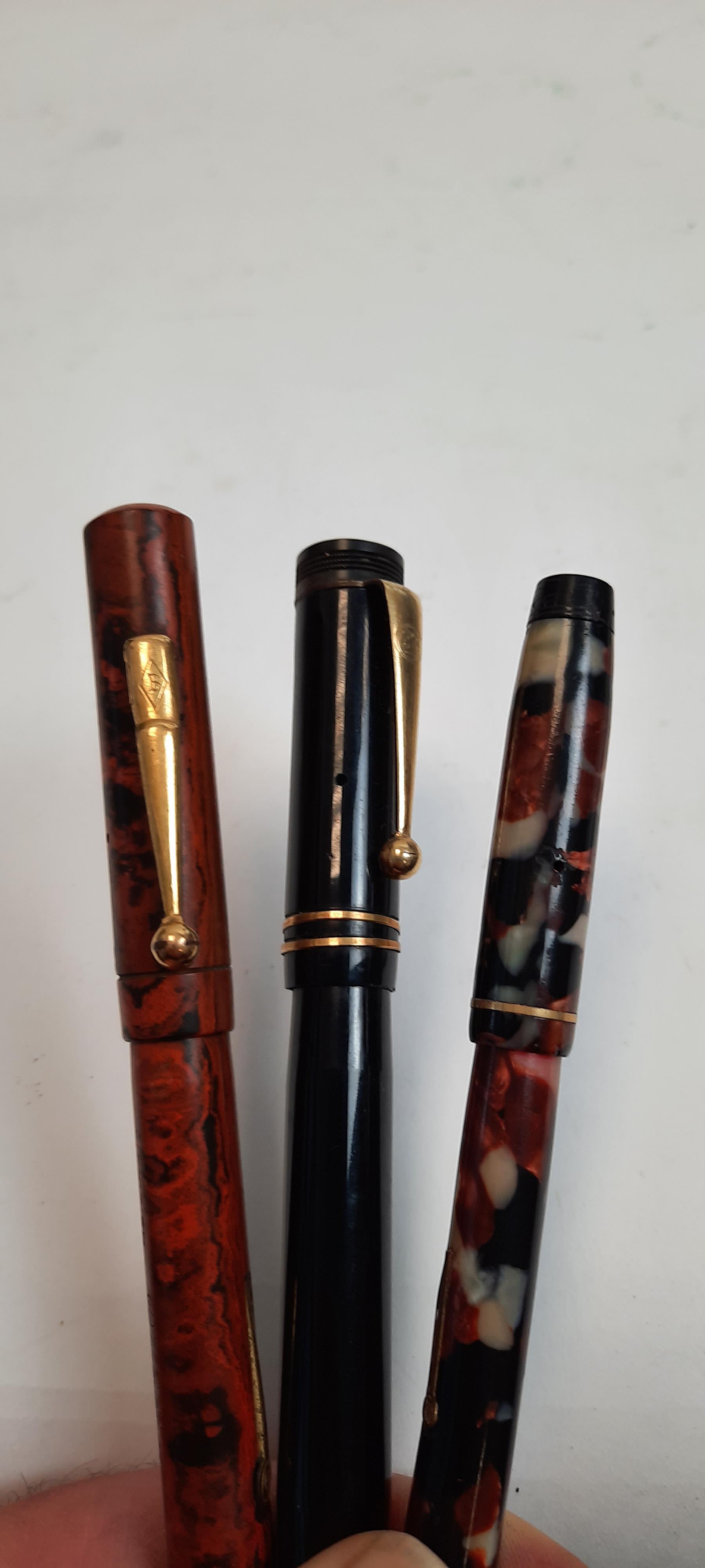 Lot 679 - Three early Burnham fountain pens