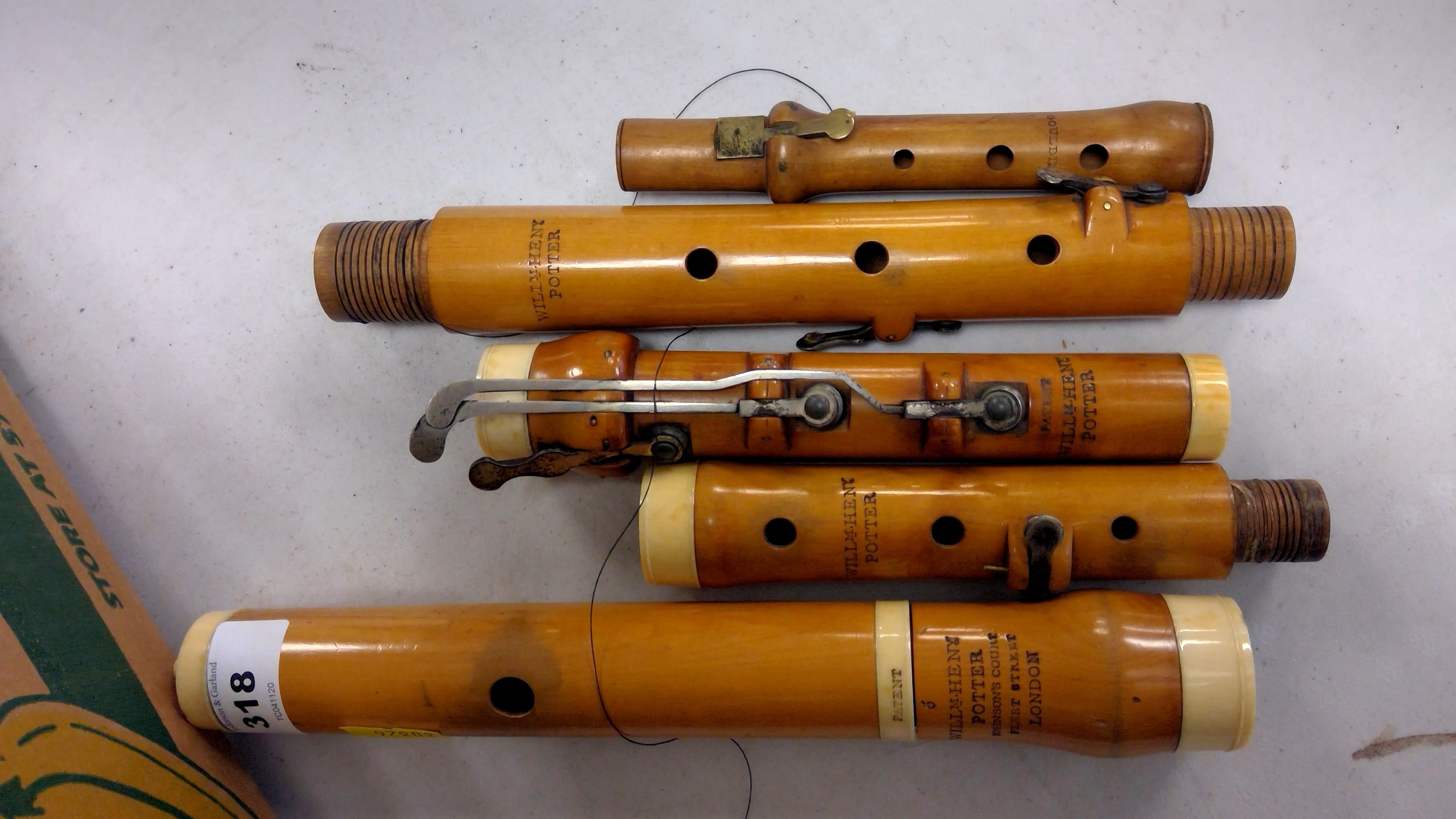 Lot 318 - 19th Century turned wood and ivory flute.