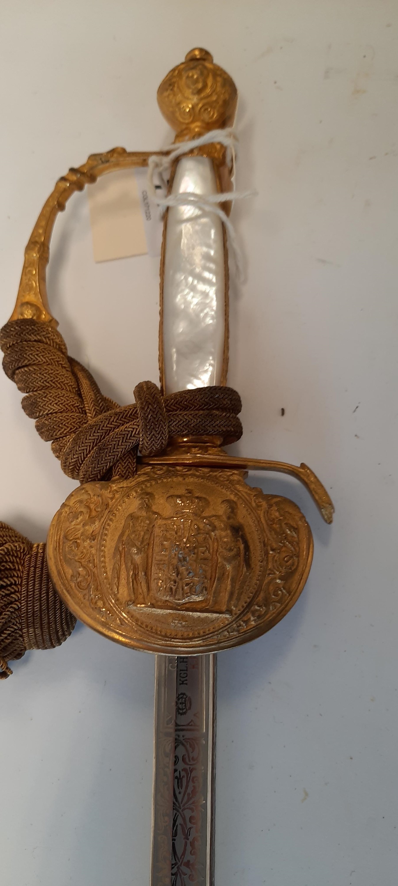 Lot 717 - A Royal Danish short sword by C. L. Seifert