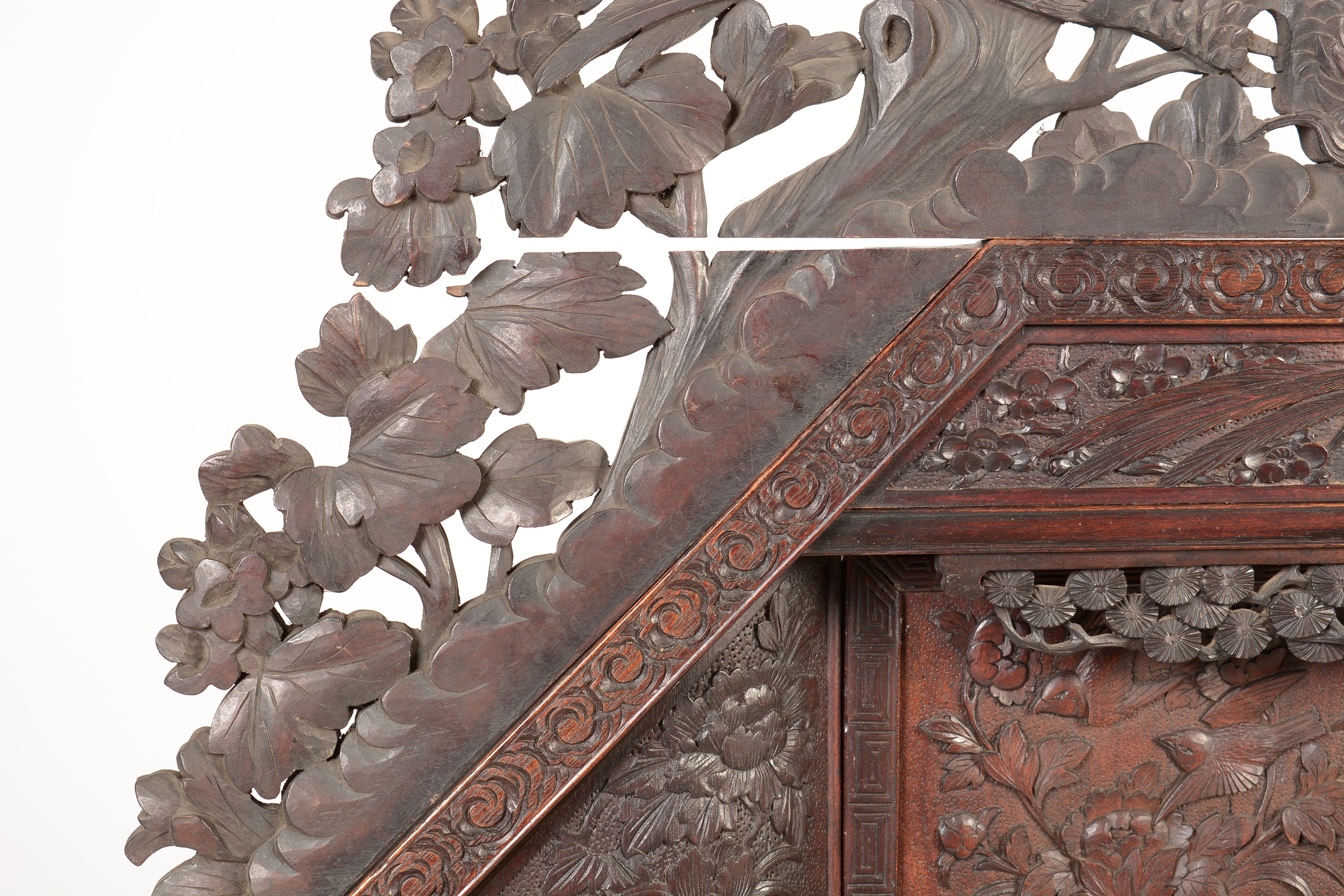 Lot 847 - A Japanese carved netsuke display cabinet.