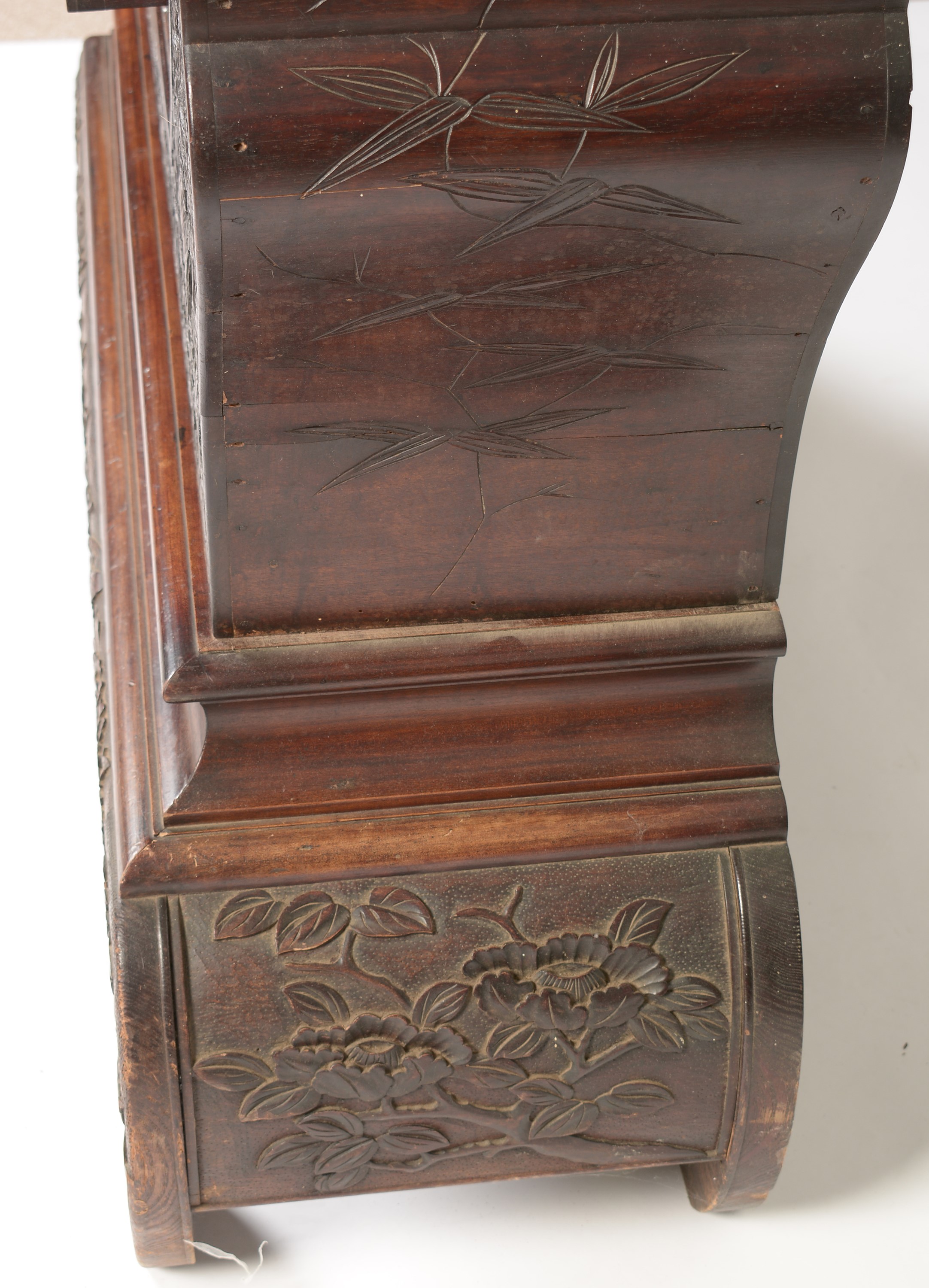Lot 847 - A Japanese carved netsuke display cabinet.