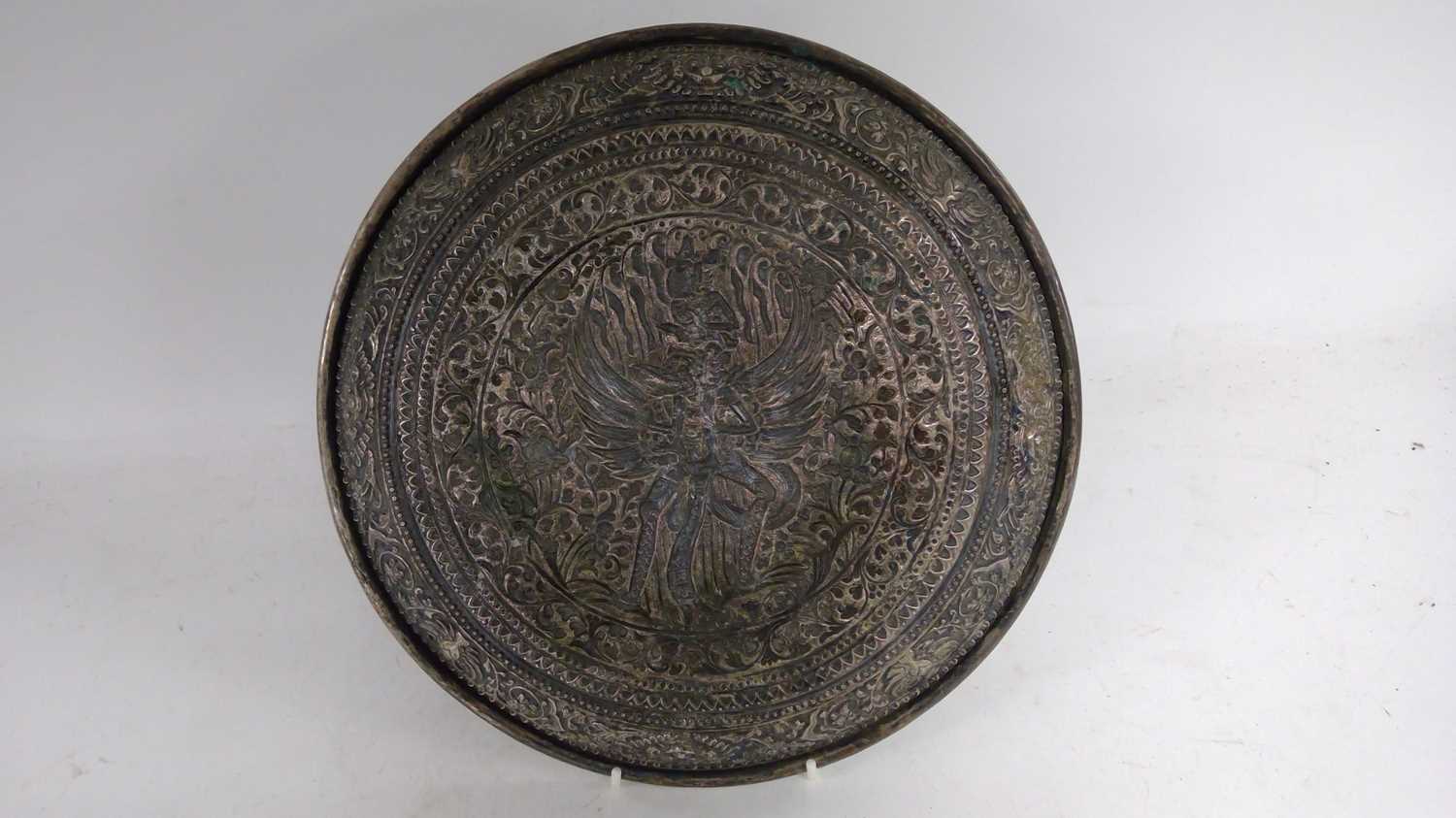 Lot 403 - Asian circular plaque.