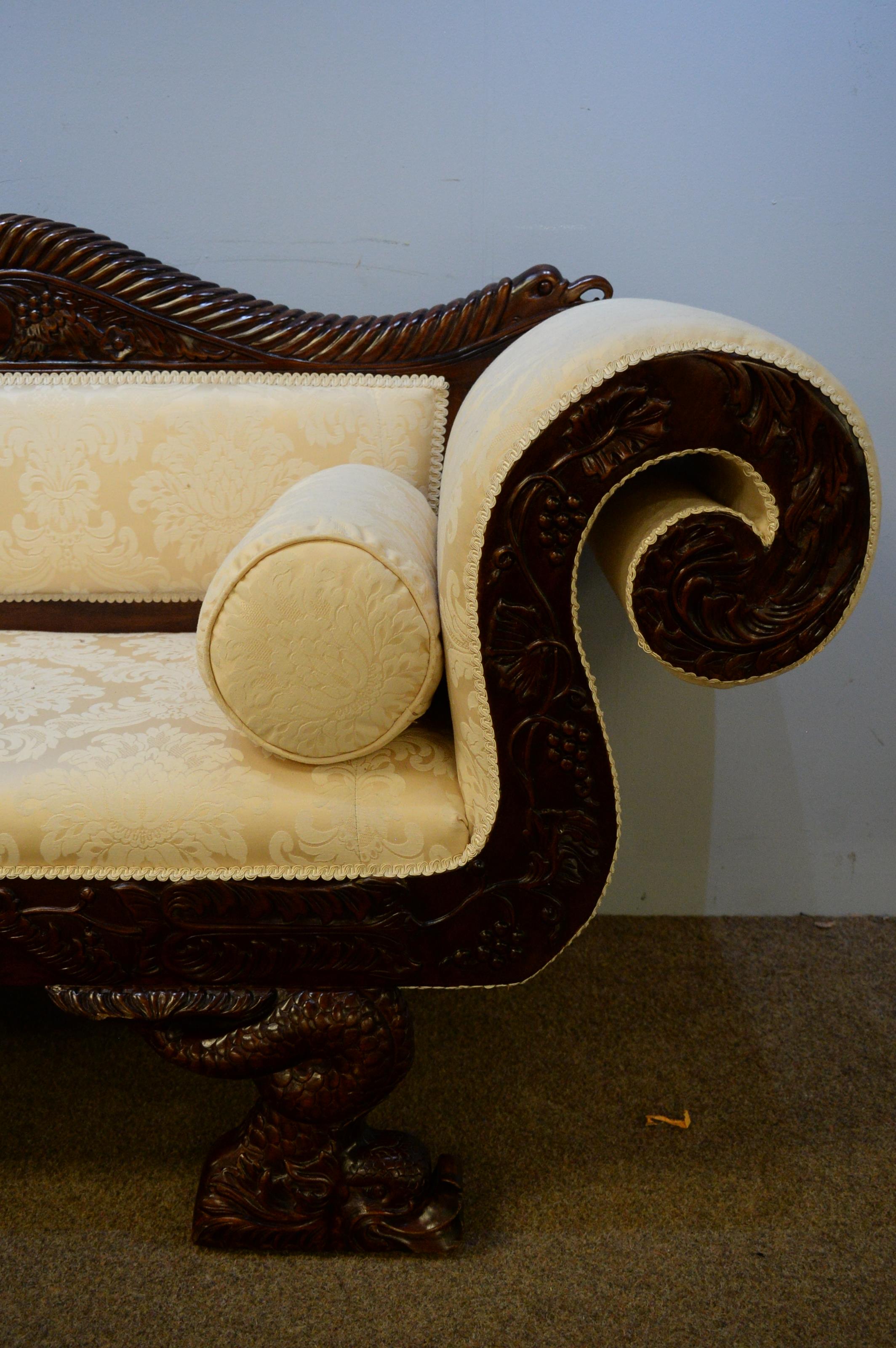 Lot 10 - A Regency style sofa.