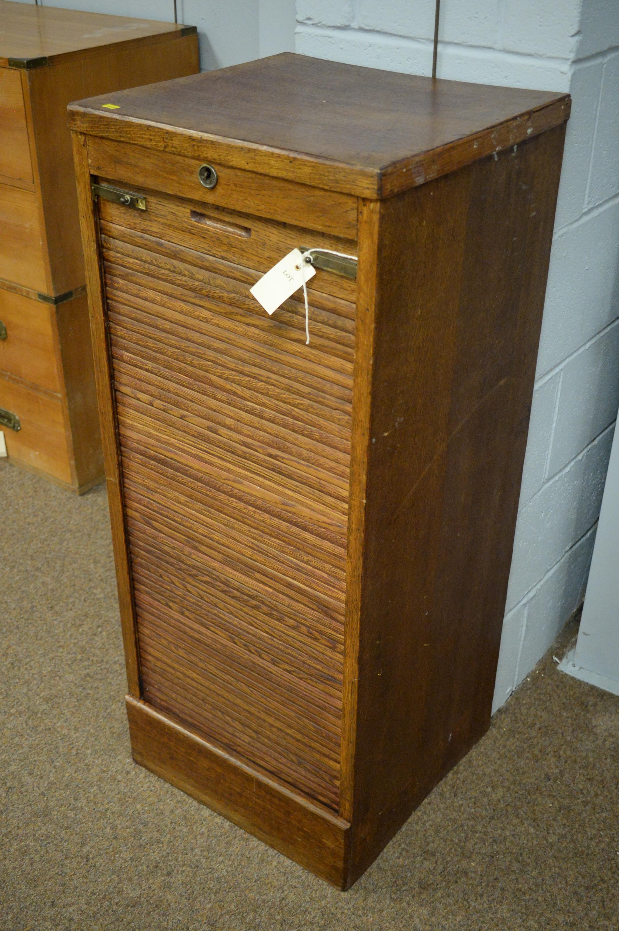 Lot 110 - Edwardian oak tambour front filing cabinet.