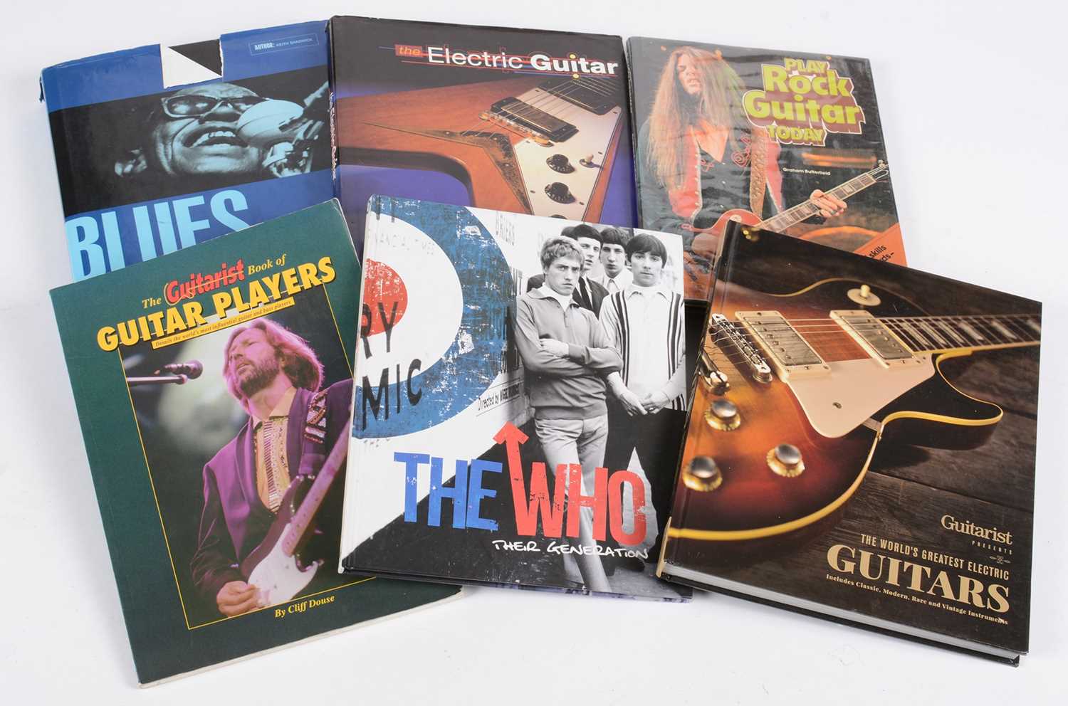 Lot 324 - 18 Guitar reference books and catalogues