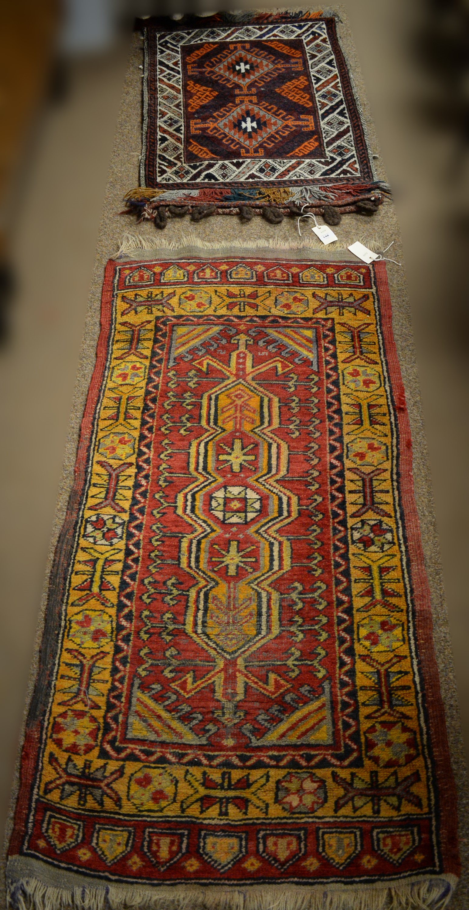 Lot 148 - A North West Persian mat; and an Afghan