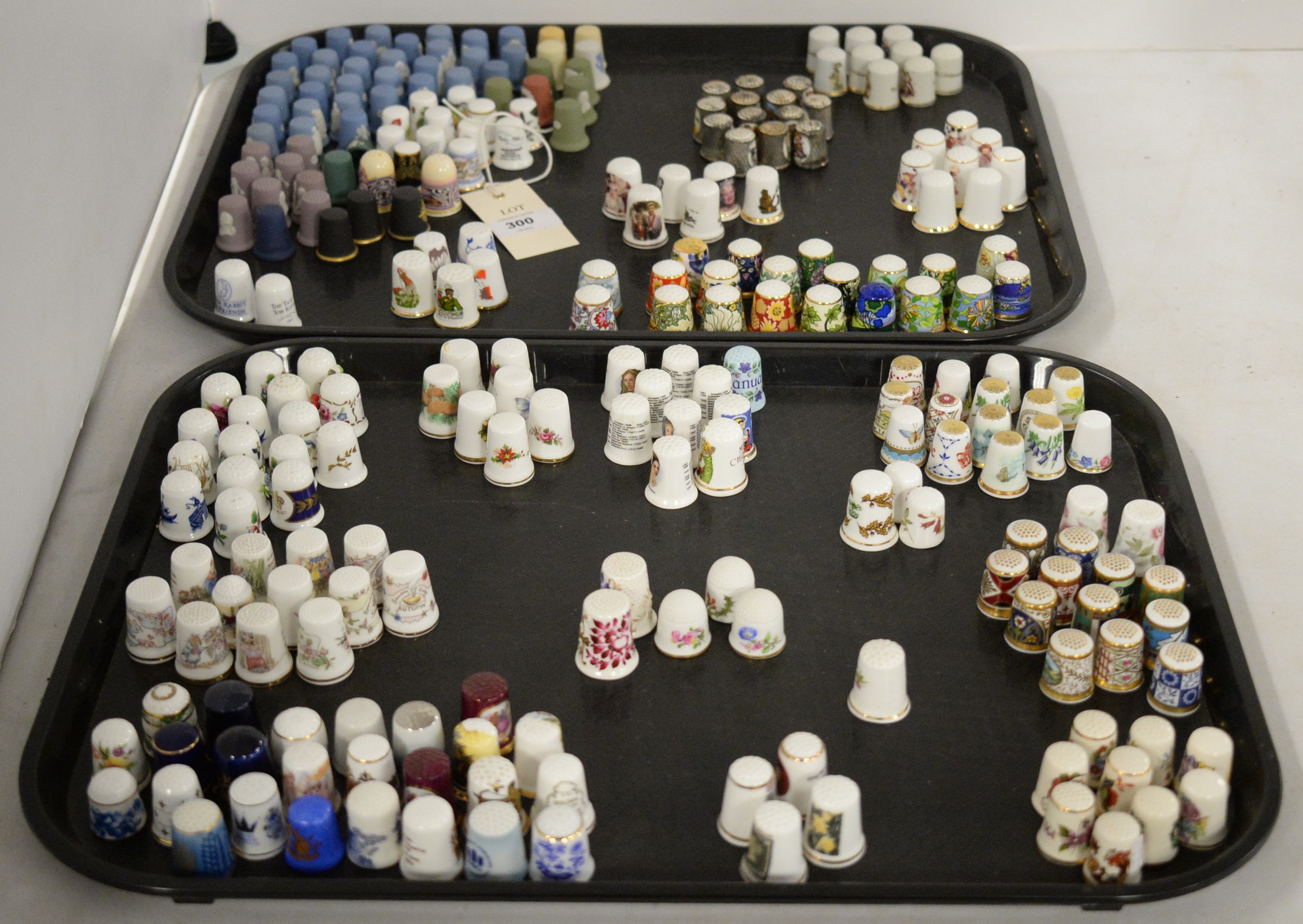 Lot 300 - A collection of thimbles including Wedgwood