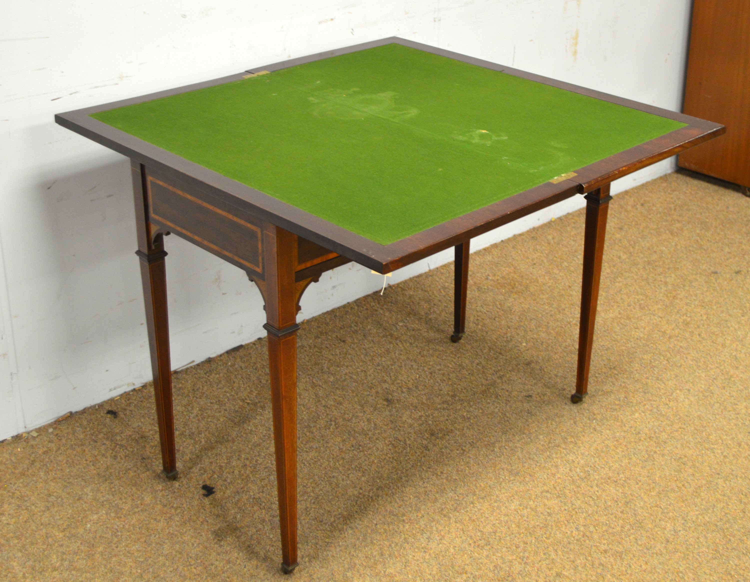 Lot 3 - An Edwardian card table.