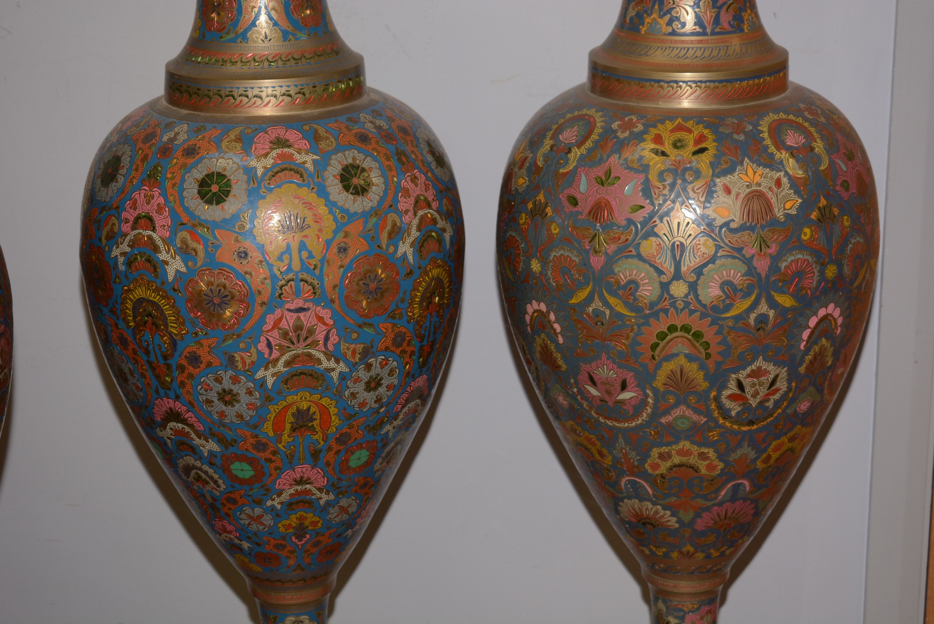 Lot 11 - A selection of four Indian enamelled brass