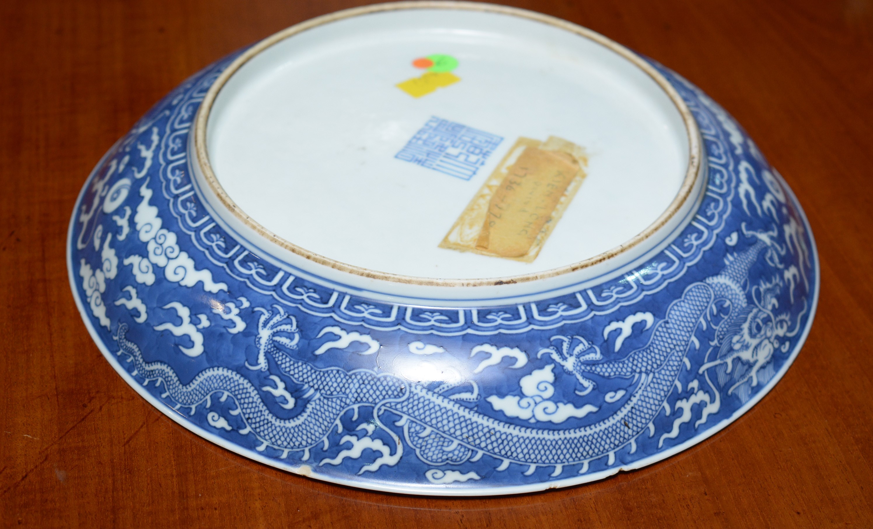 Lot 646 - Chinese blue and white dragon dish