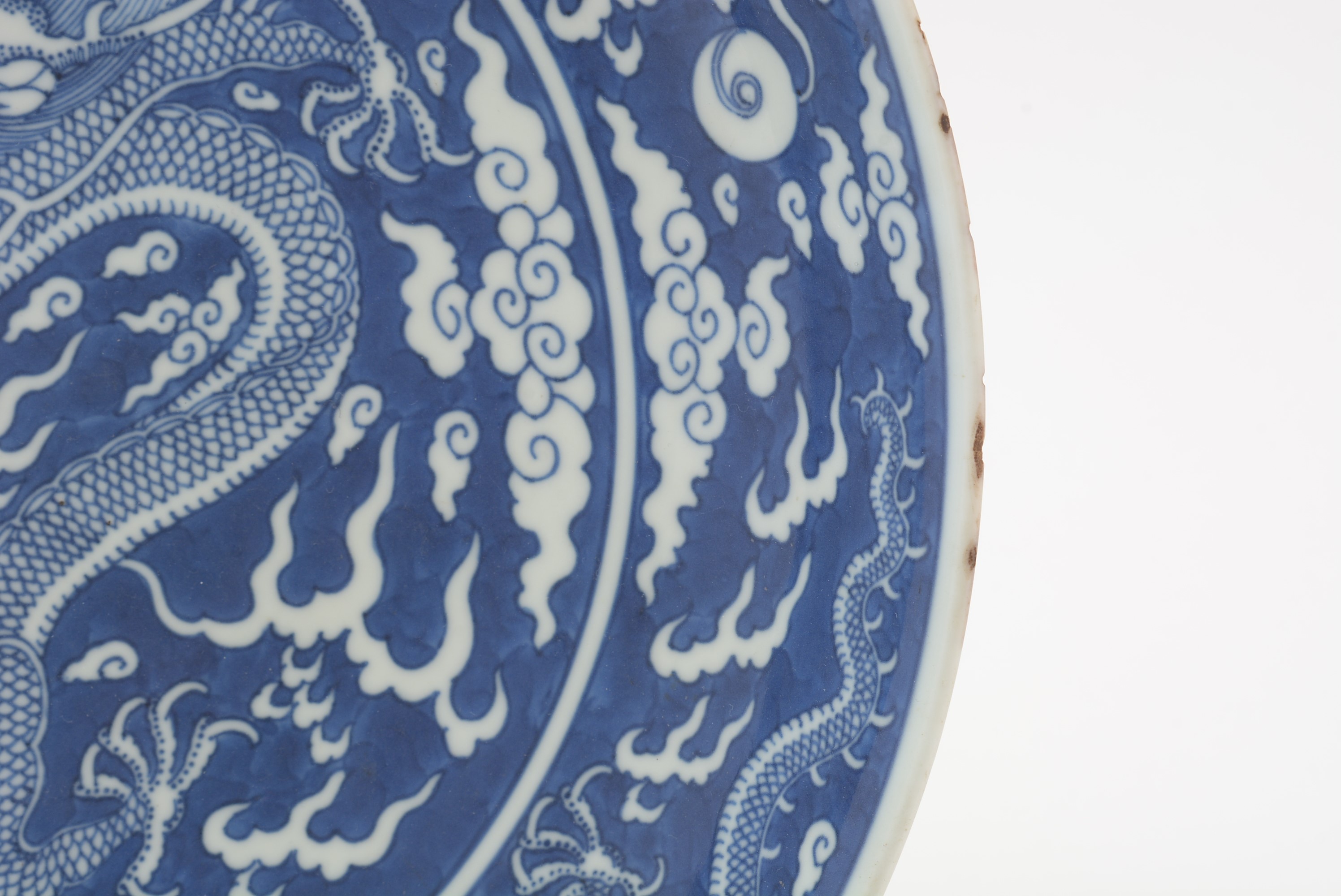 Lot 646 - Chinese blue and white dragon dish