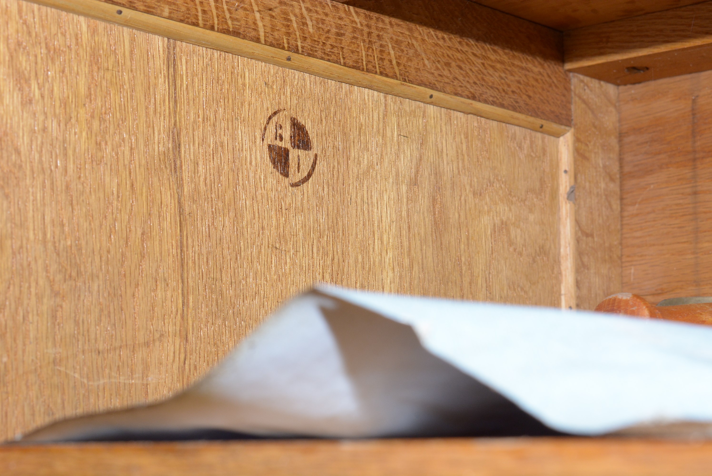 Lot 339 - A 1930s oak sideboard by Boosbeck Industries.