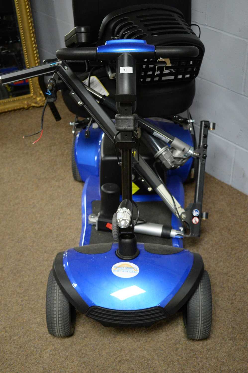 Lot 34 - Vantage mobility scooter; and an auto chair