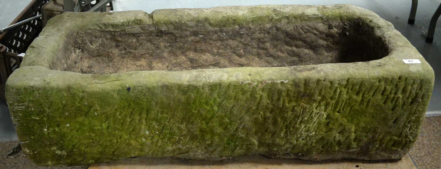 Lot 85 - A stone composite trough garden planter.