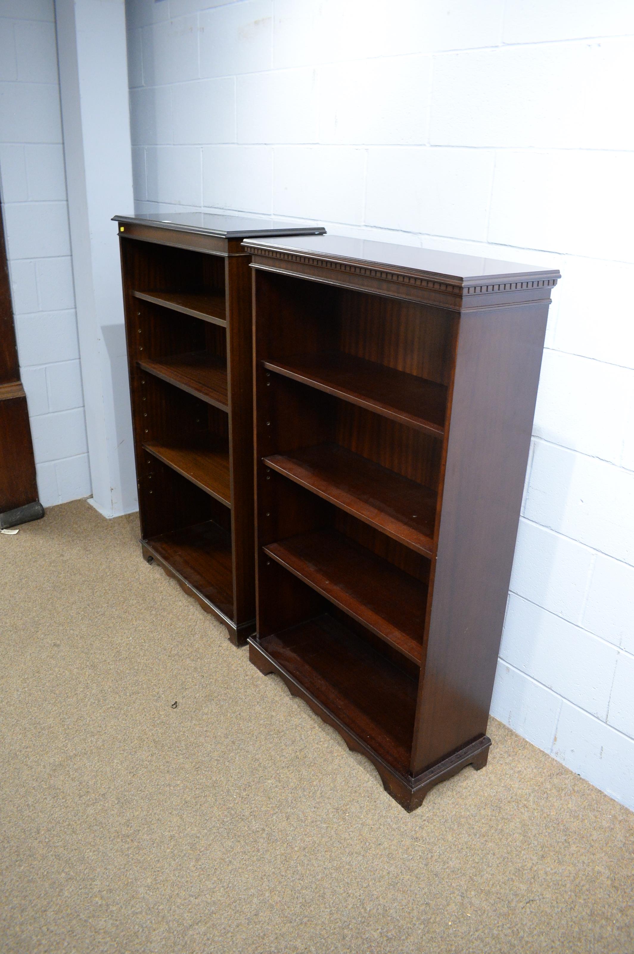 Lot 9 - Two reproduction mahogany open bookcases.
