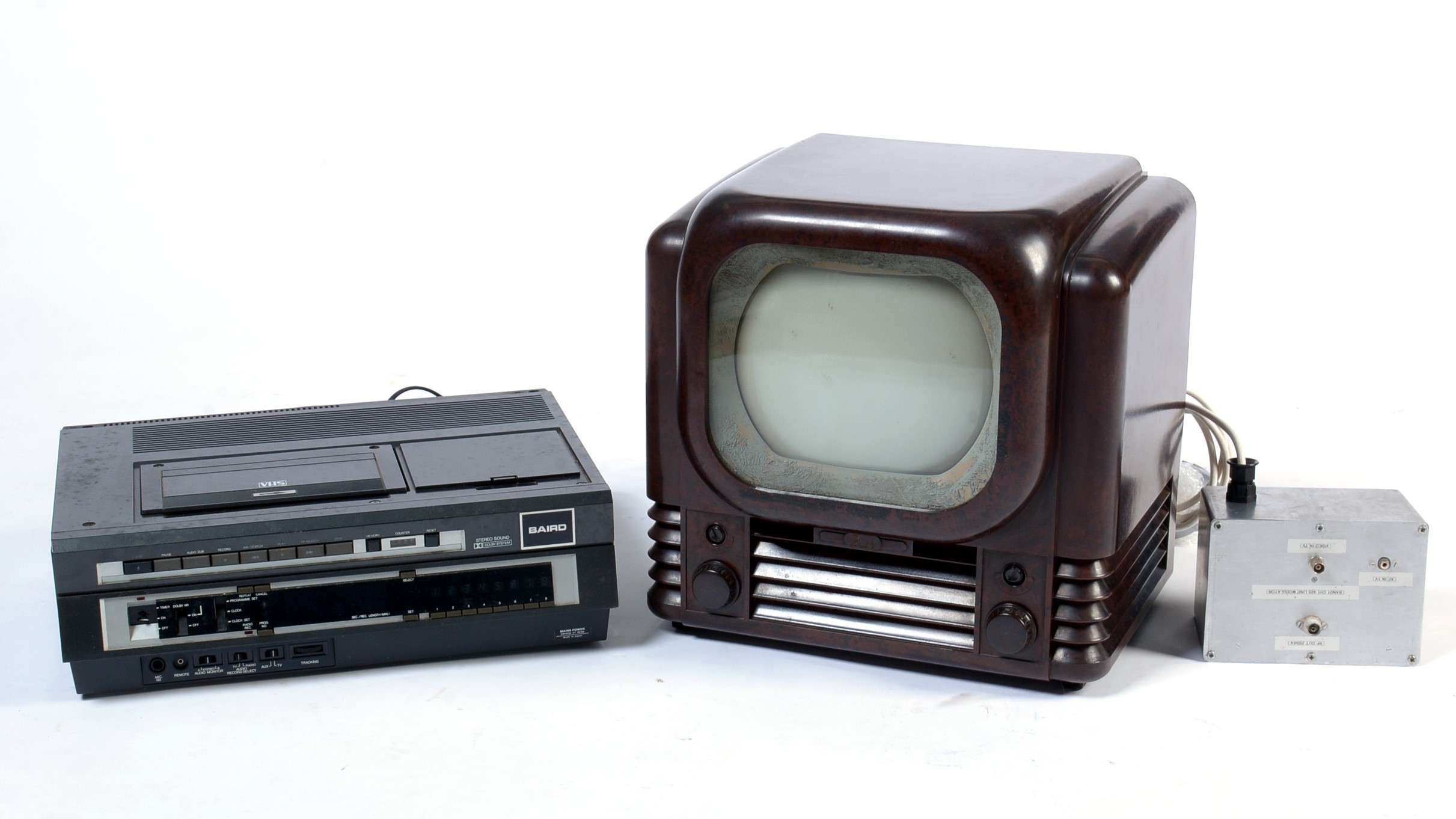 Lot 40 - Bush bakelite TV, demodulator and VHS player.