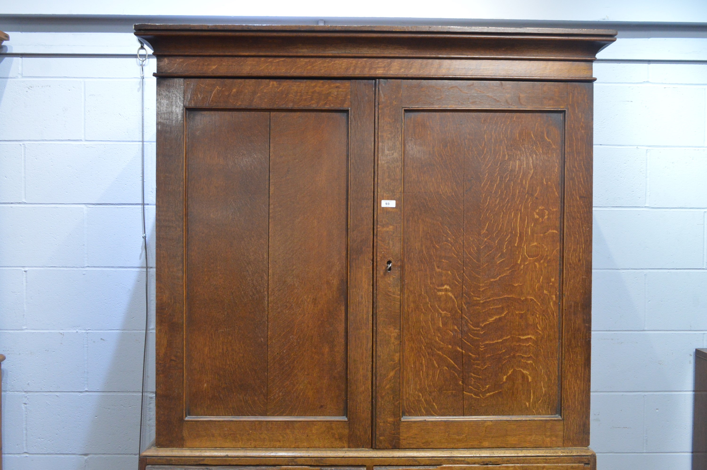 Lot 93 - A Georgian oak press.