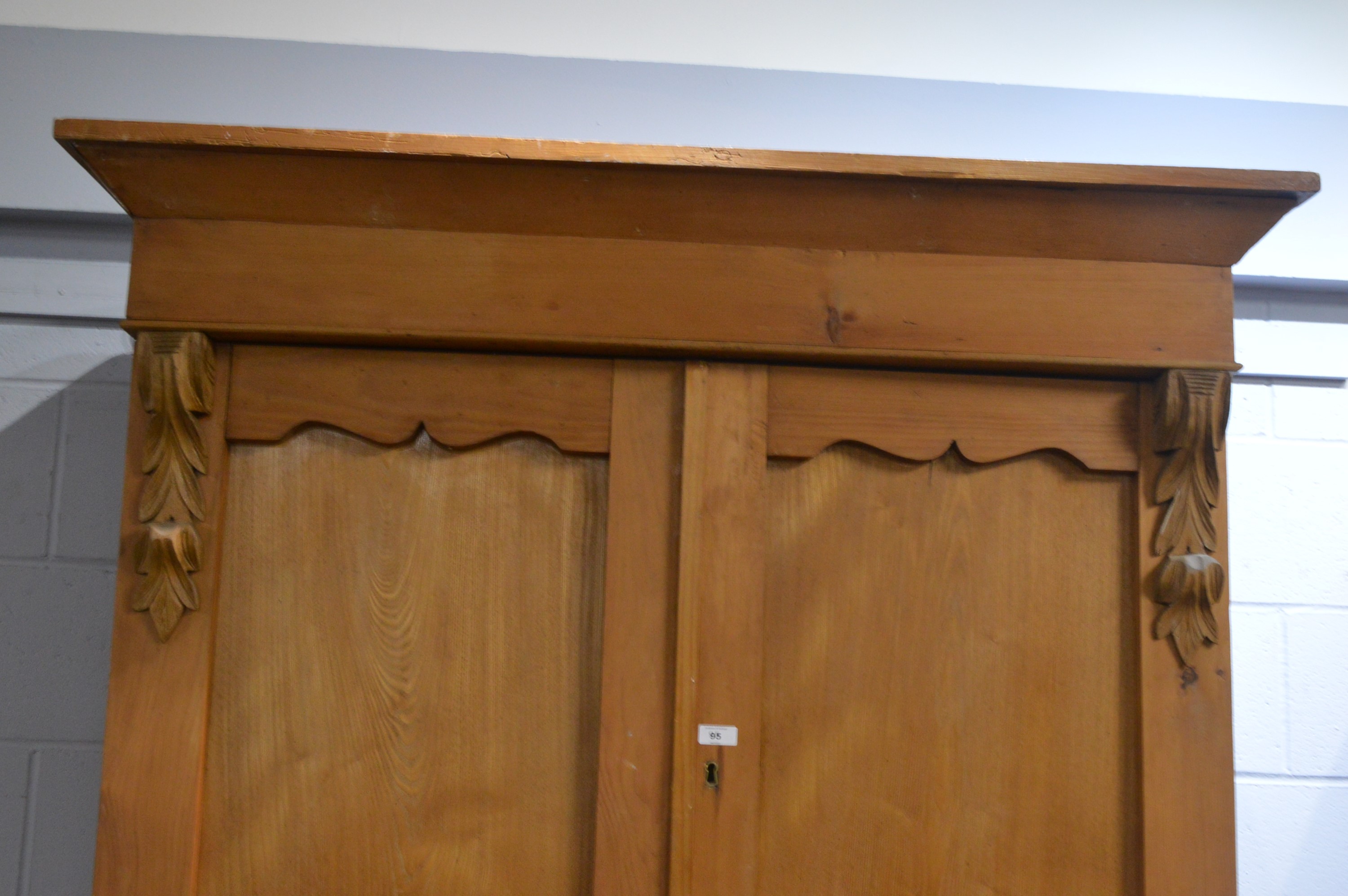 Lot 95 - A Victorian stripped pine press.