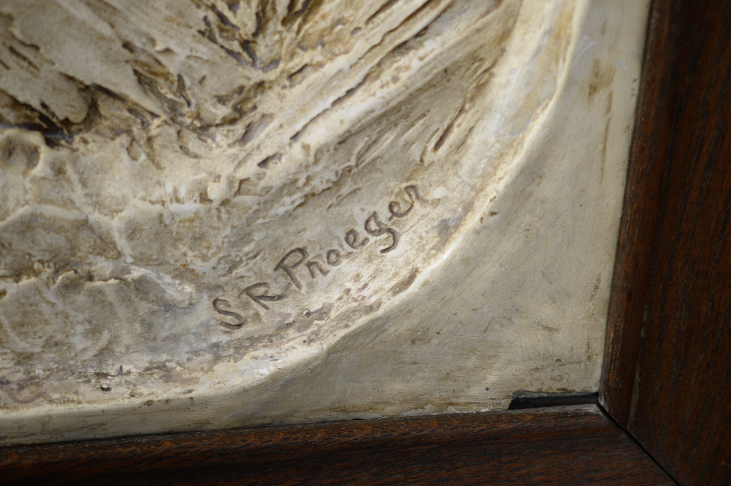 Lot 99 - An Arts & Crafts plaque, by S.R. Praeger.