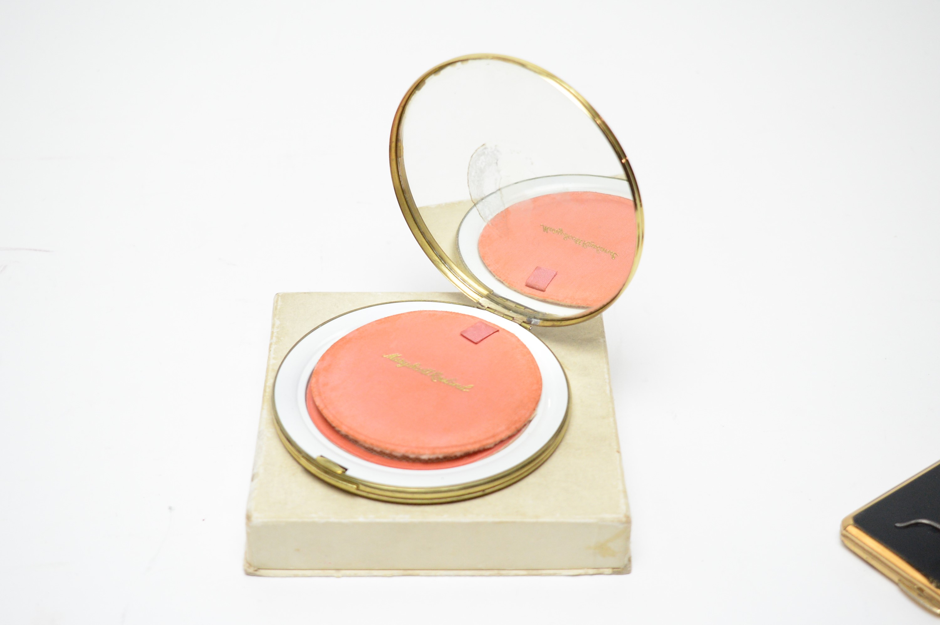 Lot 96 - 1940s powder compacts with novelty bas-relief