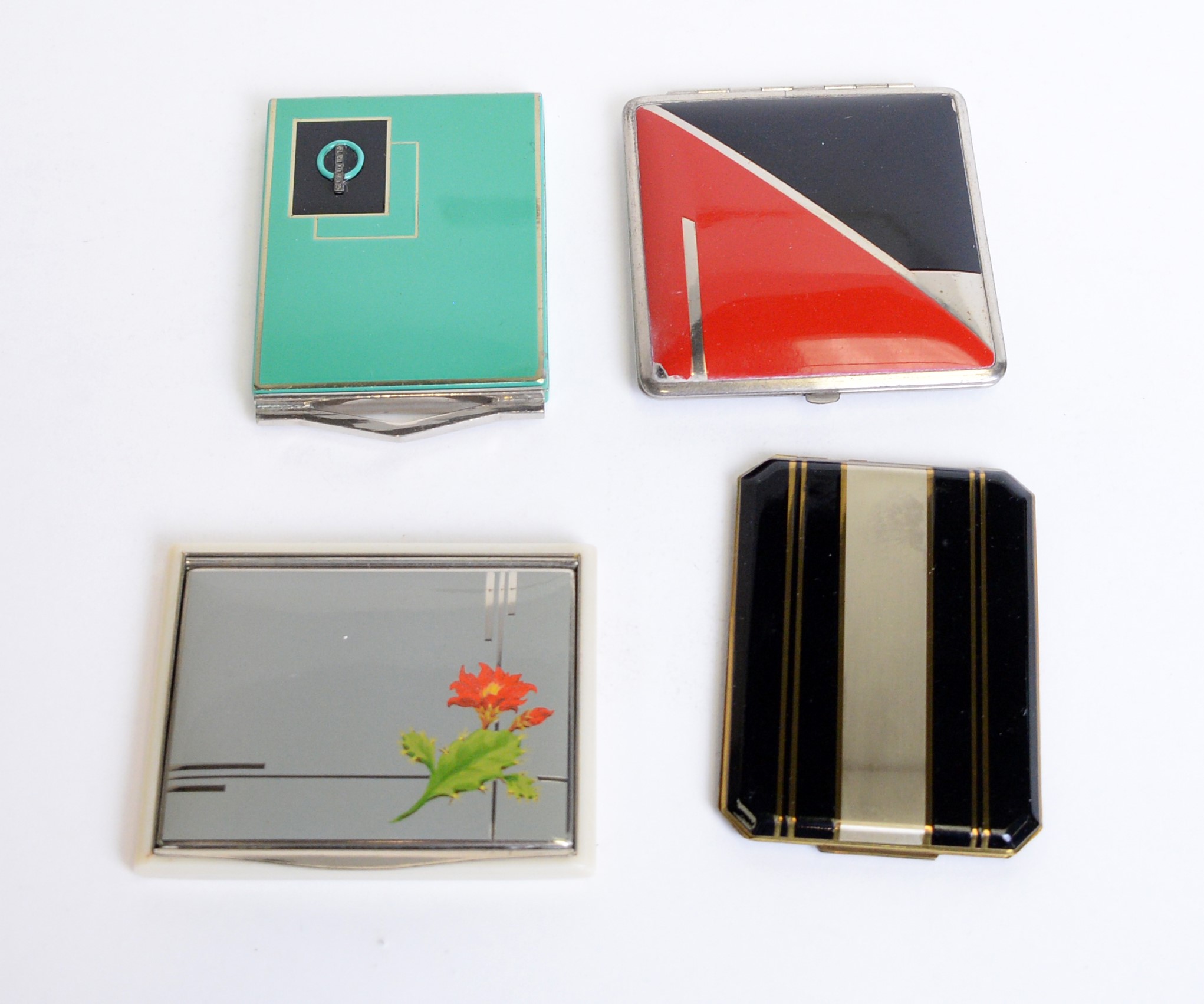 Lot 71 - Four 1930s Art Deco loose powder compacts