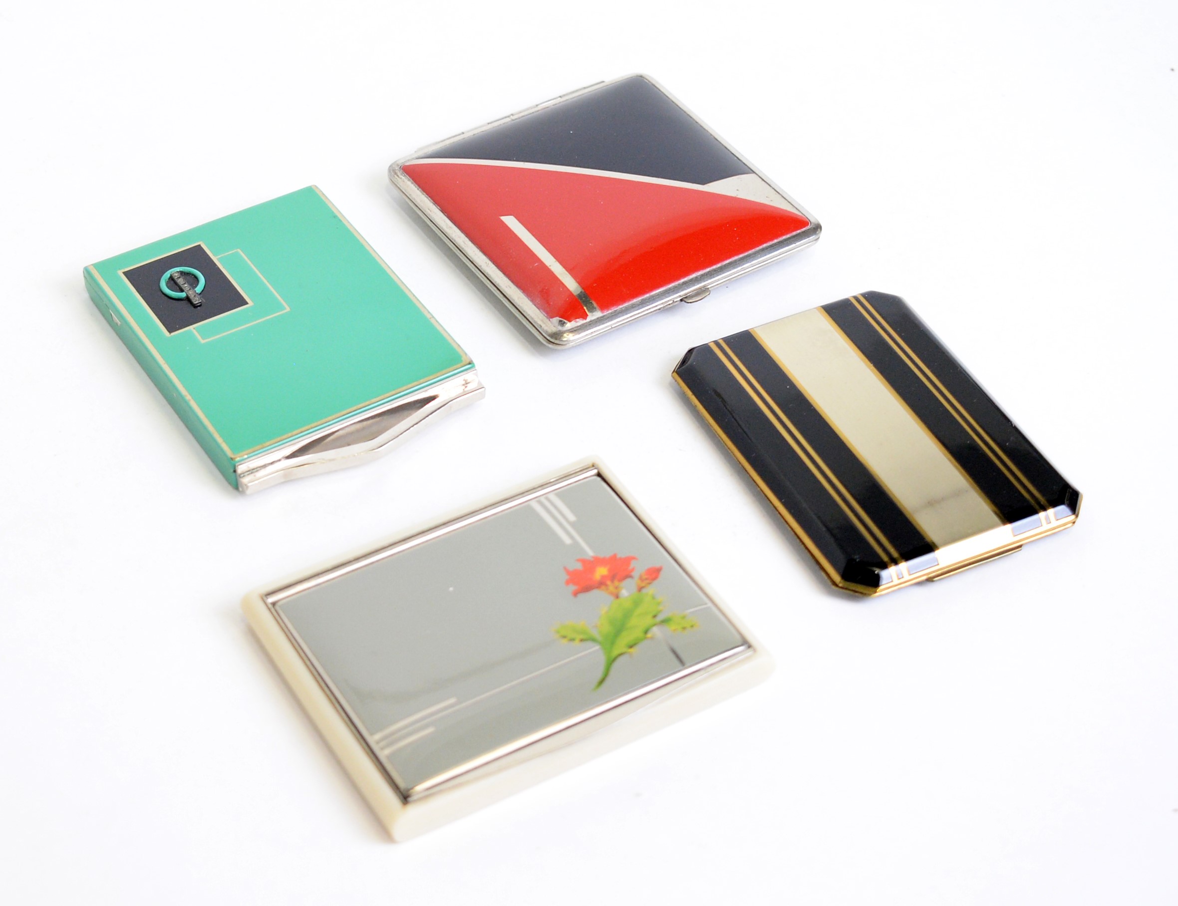 Lot 71 - Four 1930s Art Deco loose powder compacts