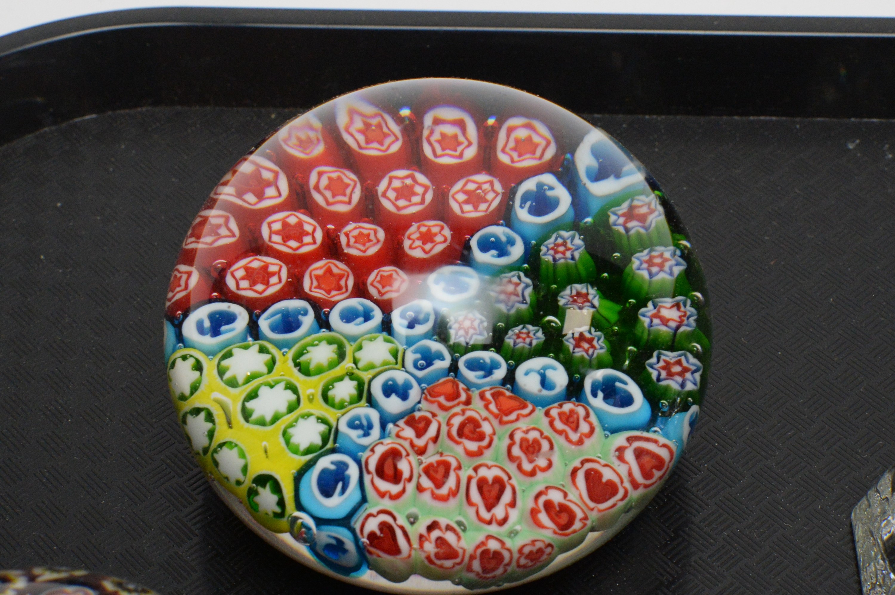 Lot 128 - A collection of glass paperweights