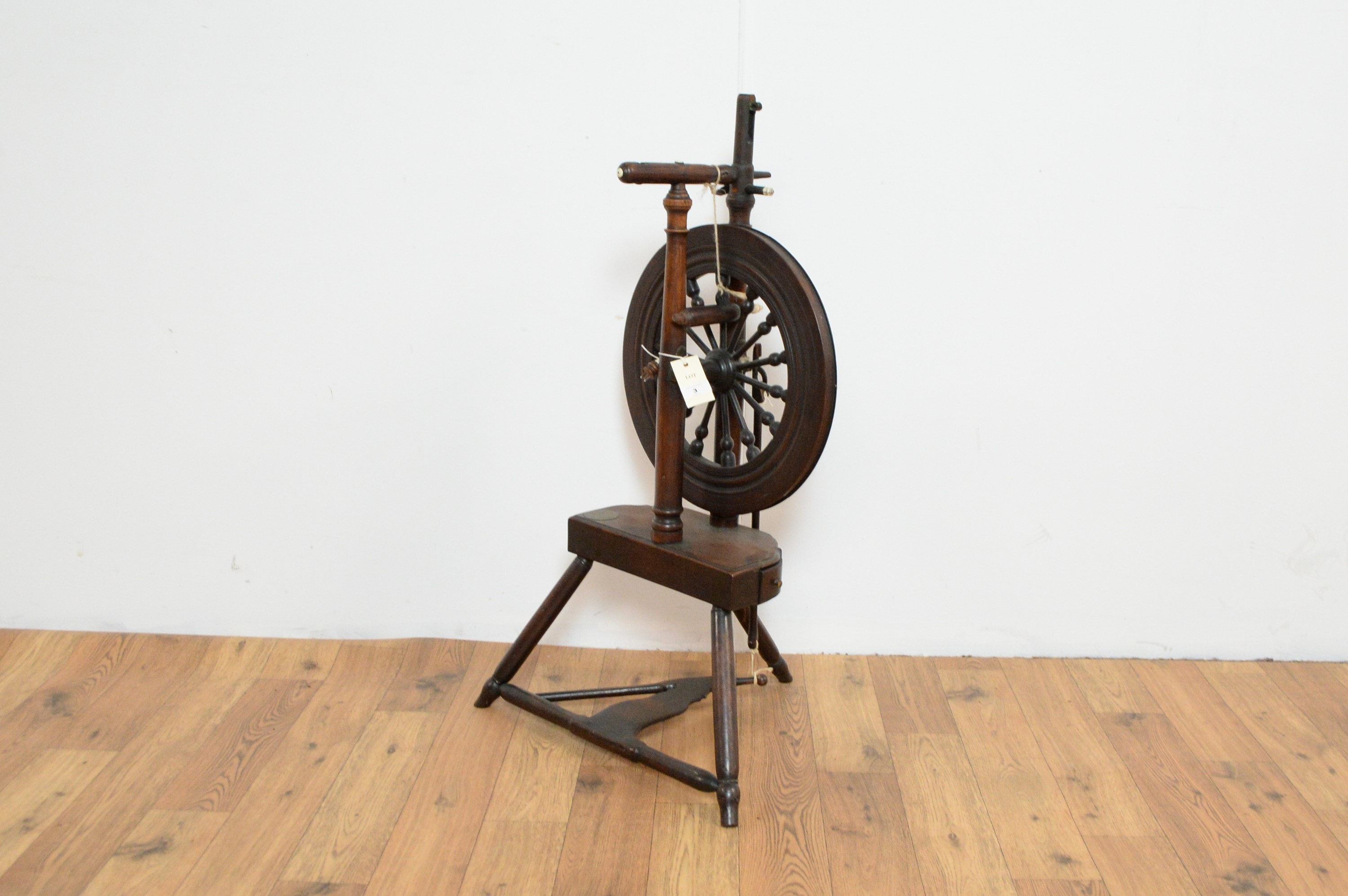 Lot 3 - A 19th Century spinning wheel by James Park,