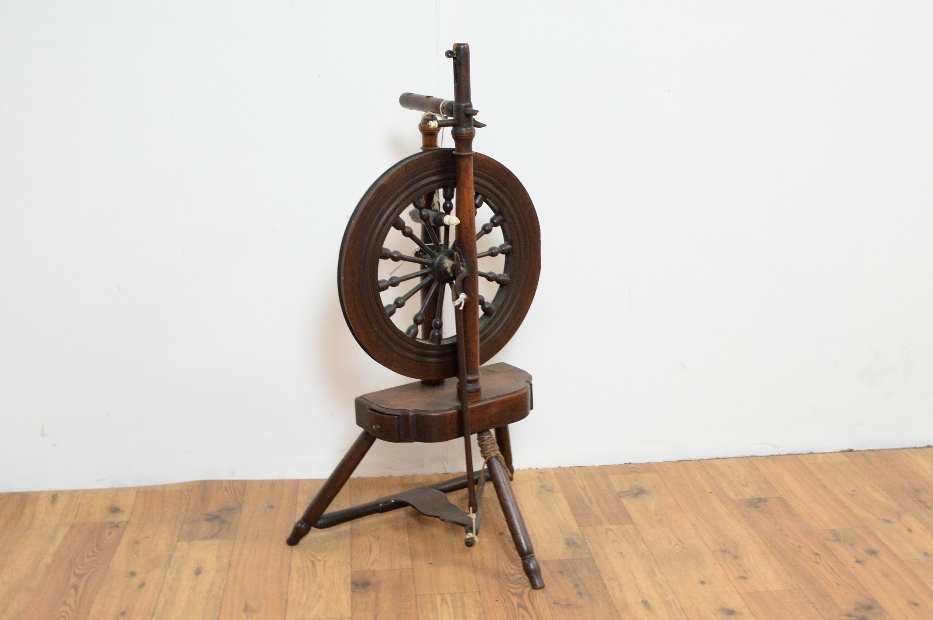Lot 3 - A 19th Century spinning wheel by James Park,
