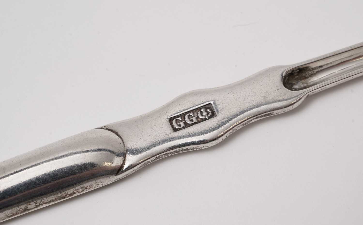 Lot 334 - A Indian beaker and marrow scoop