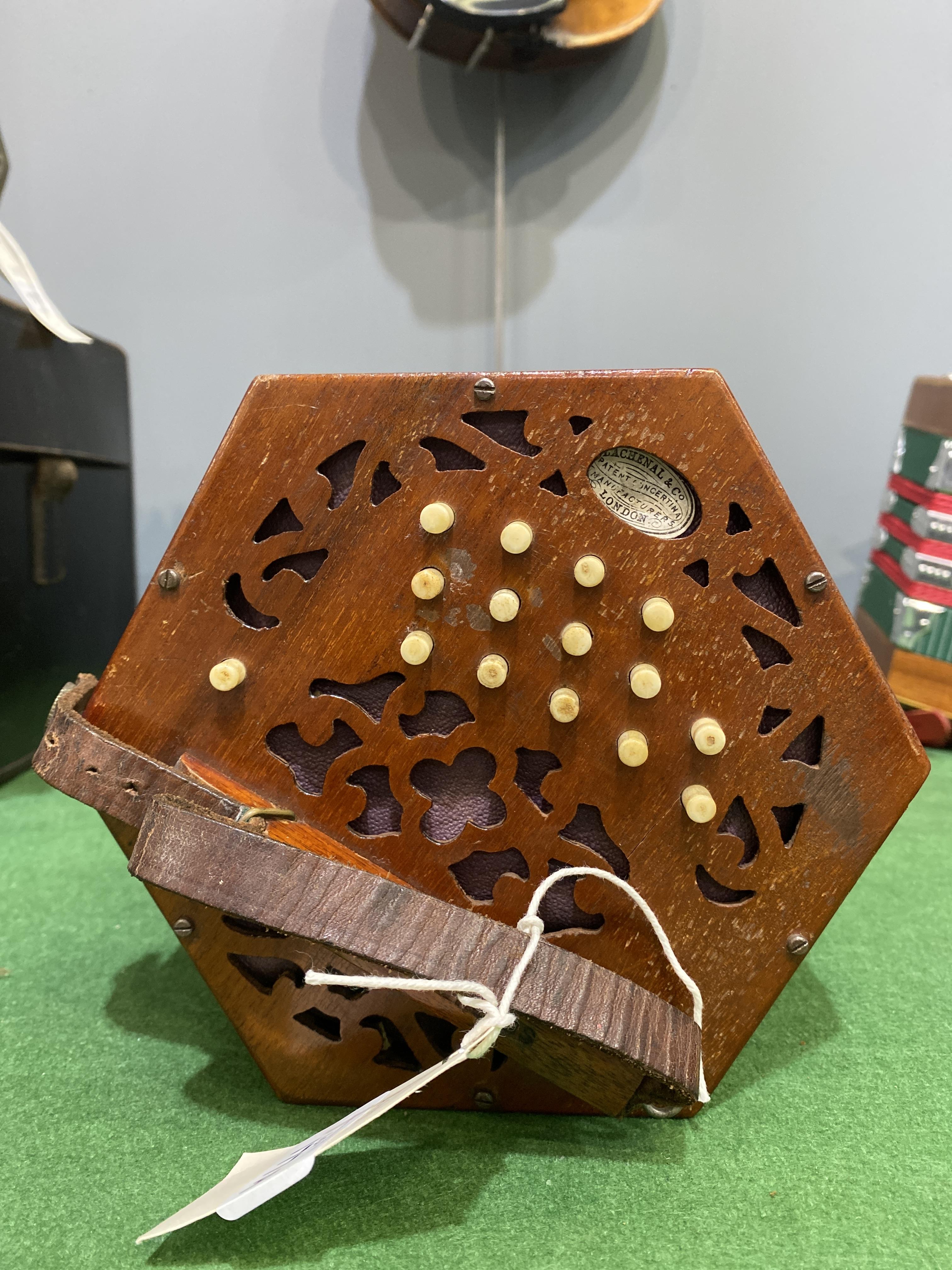 Lot 177 - A Lachenal 28-button Anglo system concertina