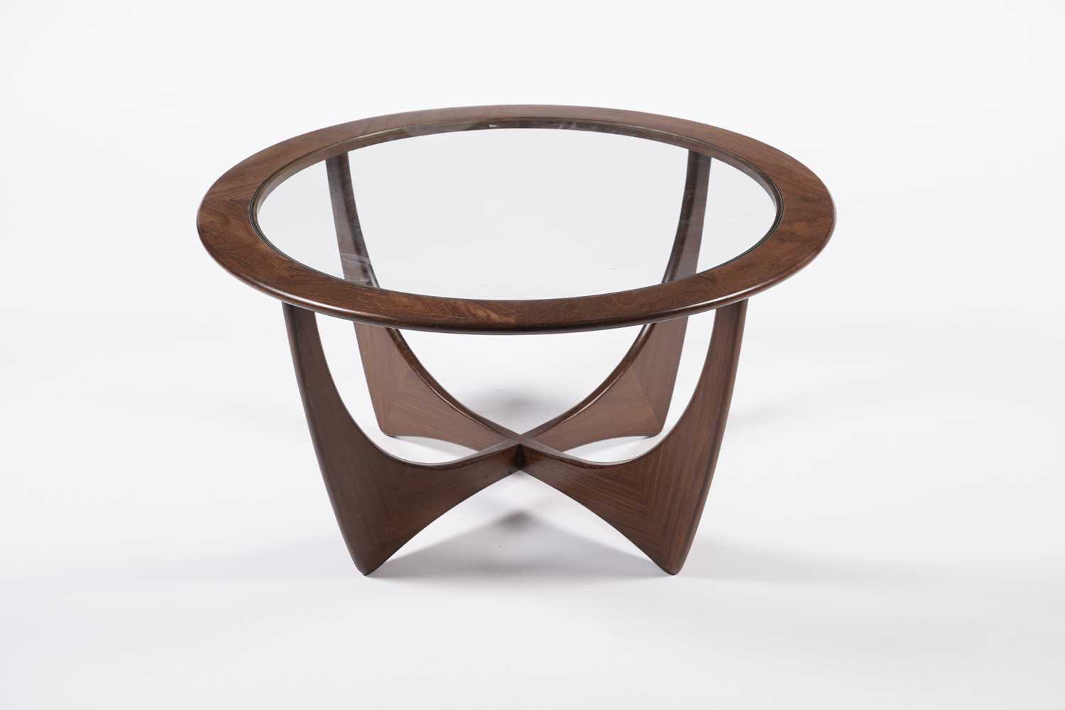 Lot 762 - A G-Plan teak circular ‘Astro’ glass topped