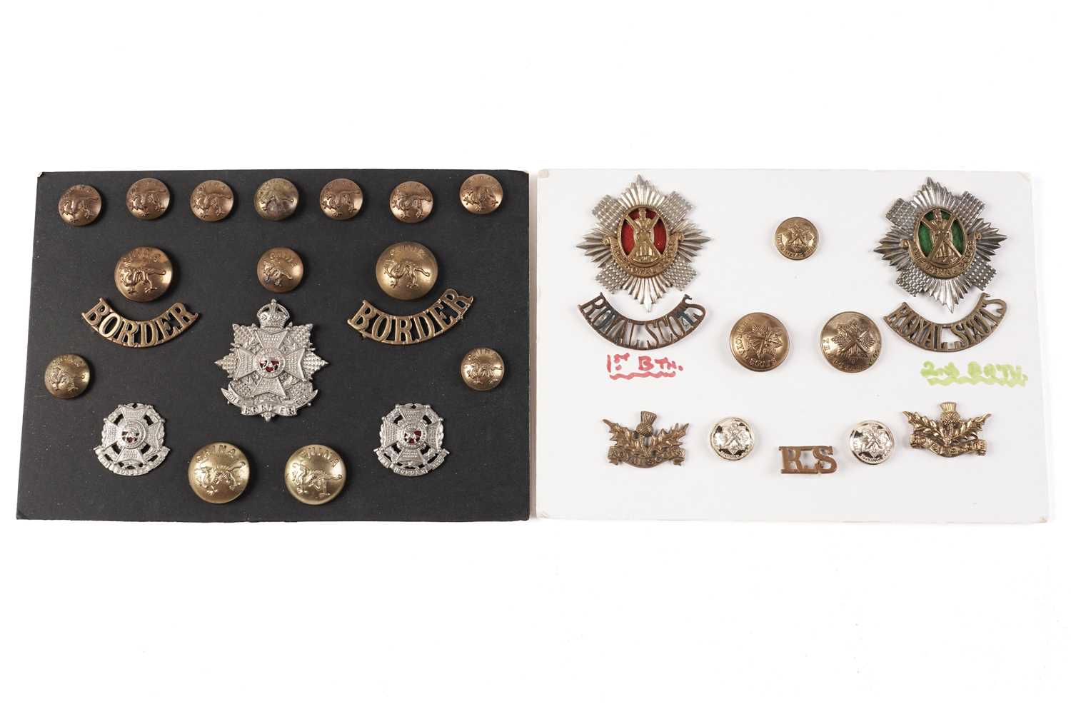 Lot 94 - Two displays cap badges, collar badges,