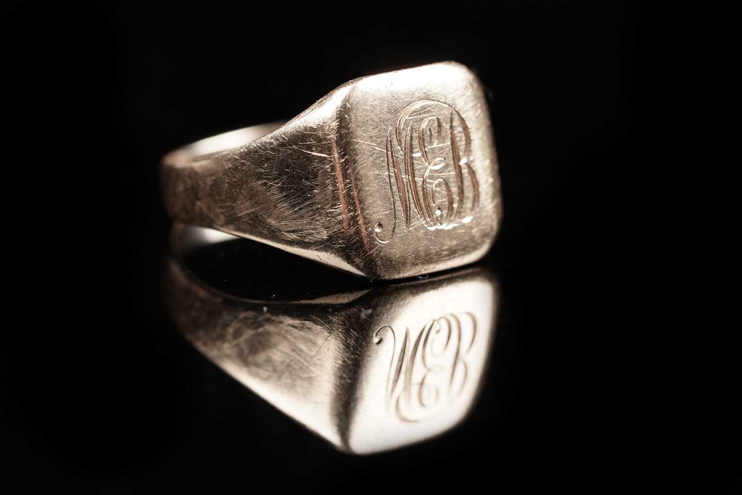 Lot 50 - An antique gold signet ring engraved with a